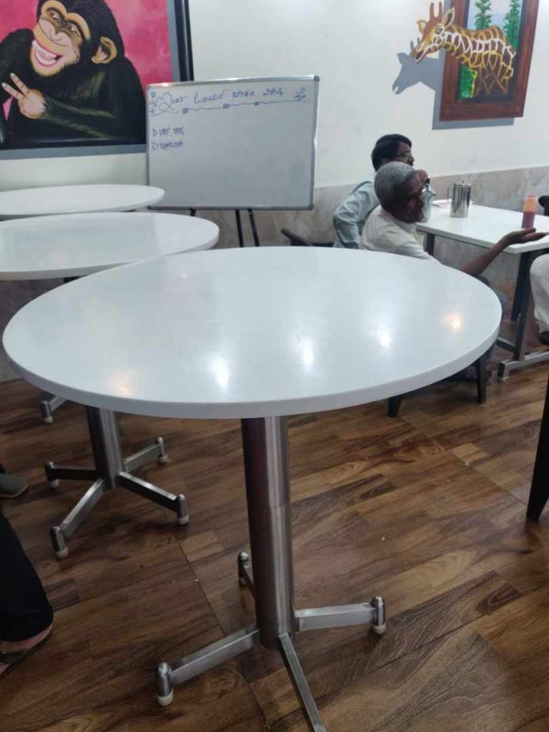 Standing Round Table - Sheela Equipments